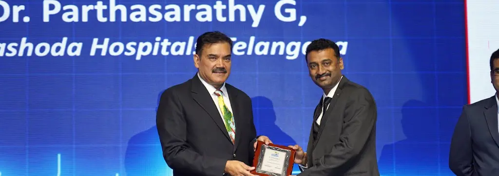 Dr. Parthasarathy